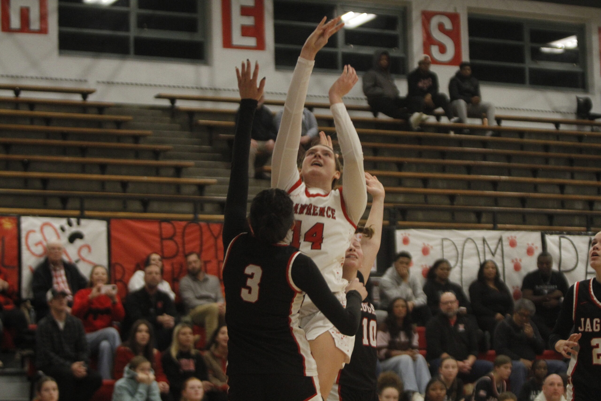 Lawrence girls basketball shakes off winter break rust with 61-44 win ...